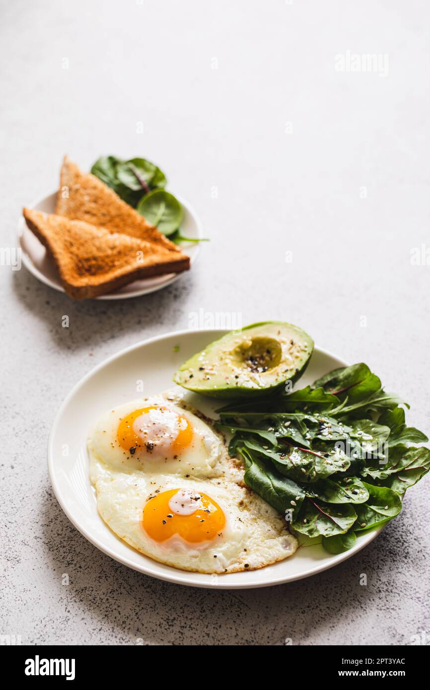 Healthy Breakfast with Wholemeal Bread Toast, Eggs with Green Salad ...
