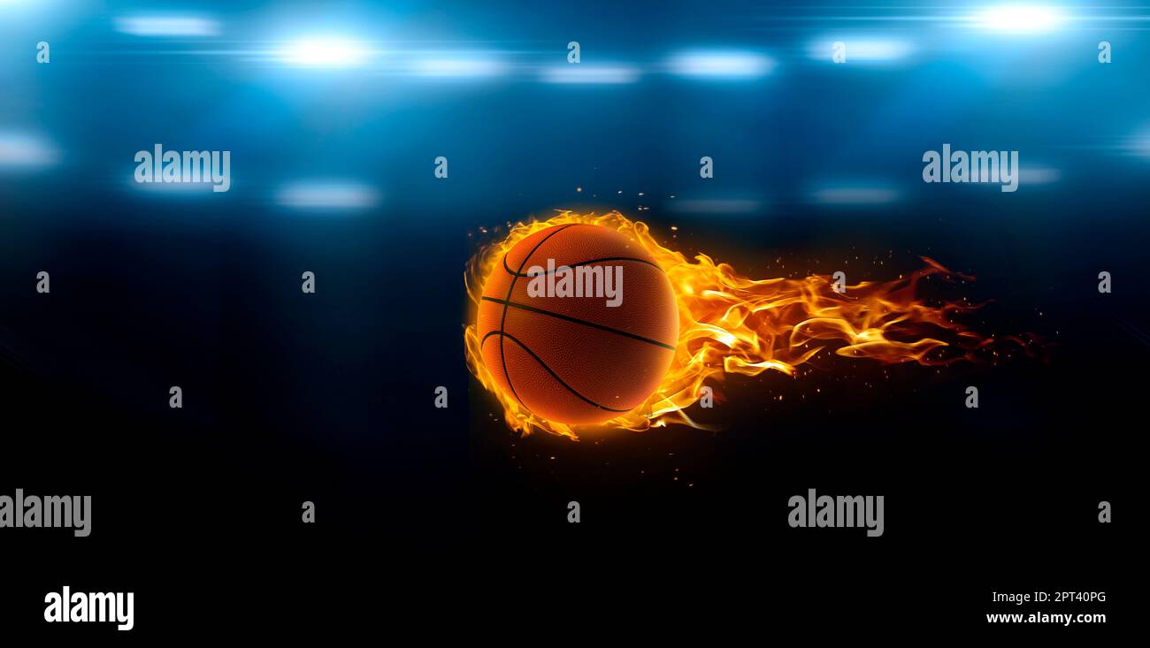 asketball on fire in basketball court stadium with lights in the field ...