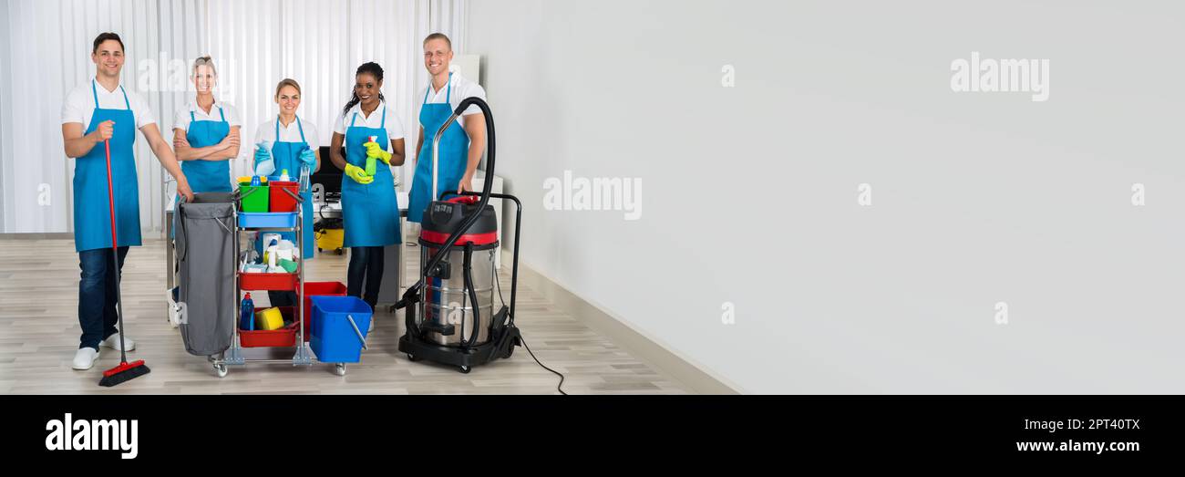 Happy Janitor Cleaning Team. Cleaner Service Group Stock Photo - Alamy