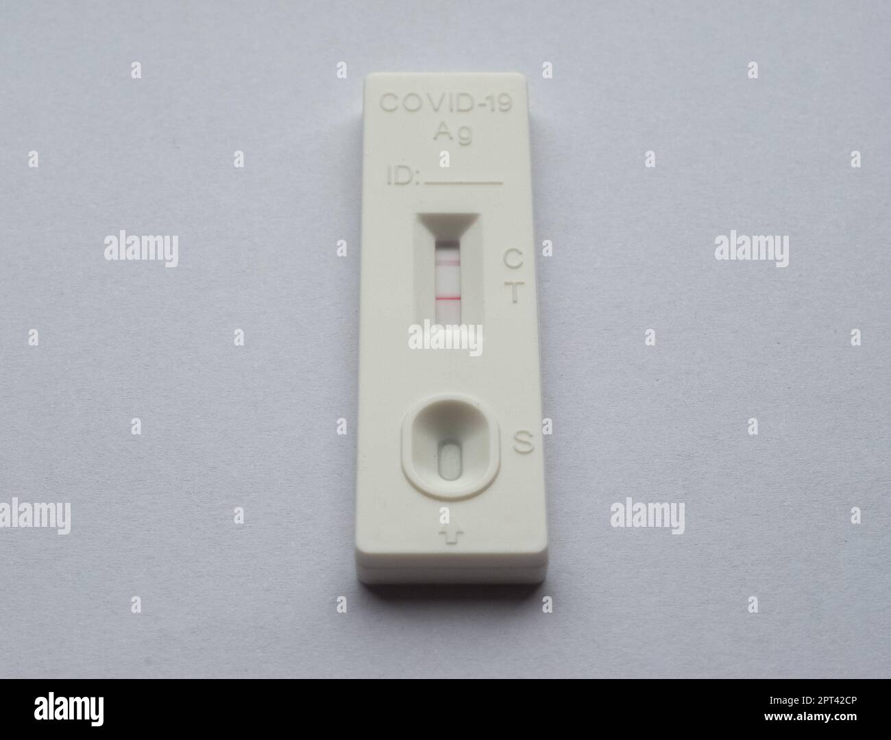 Positive Covid 19 antigen rapid test specimen well Stock Photo - Alamy