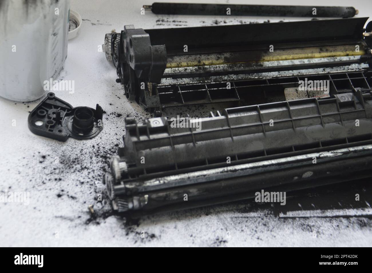 Charging the laser printer cartridge with toner the powder Stock Photo ...