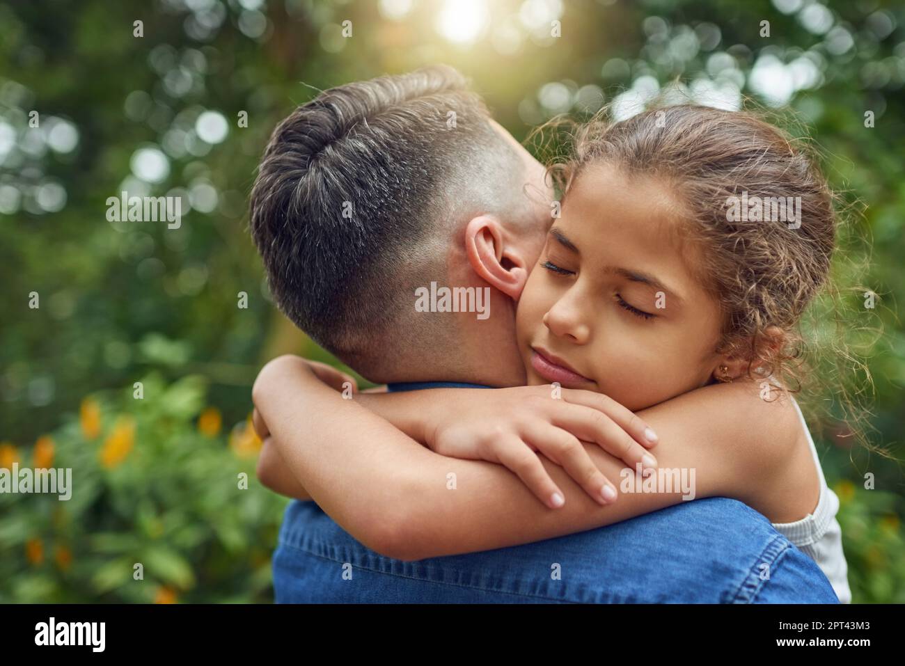 Strong Bonds That Can Never Break An Affectionate Father Embracing His