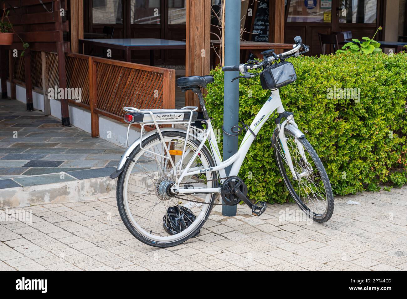 Tala, Paphos District, Cyprus - March 27, 2023 - White electric bicycle ...