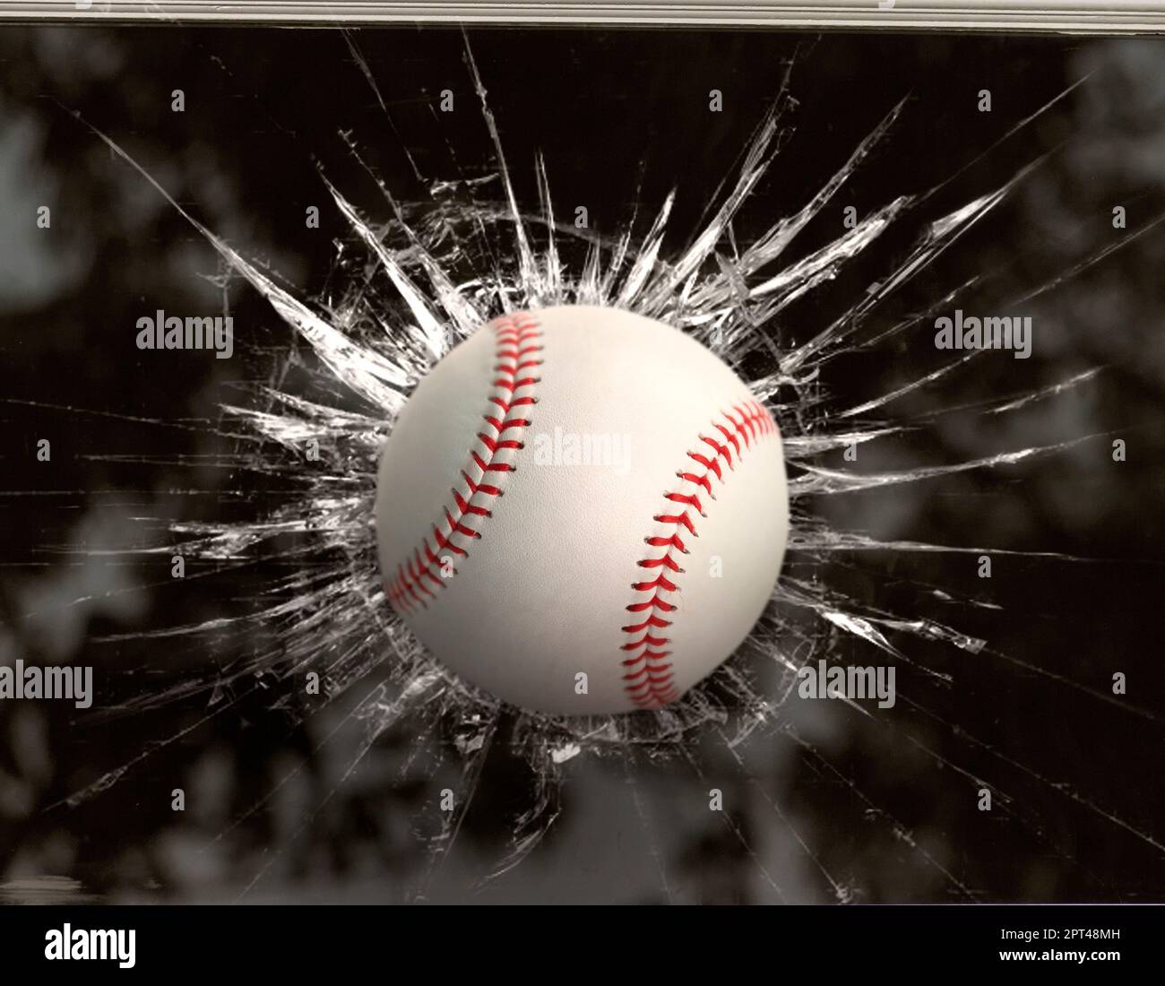 Baseball through broken window Stock Photo - Alamy