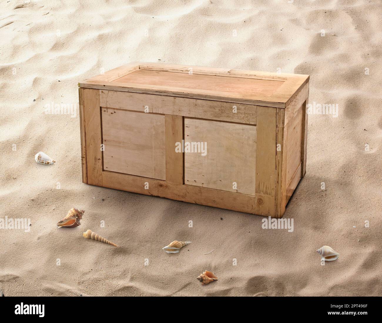 Wooden Treasure Box On The Beach With Sun Beam Stock Photo - Alamy