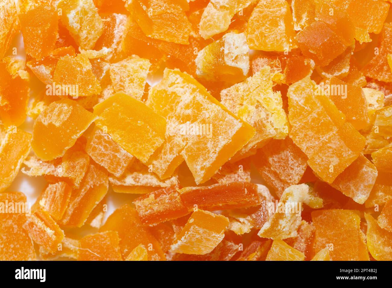 Dry mango pieces. candied fruits. food background Stock Photo - Alamy