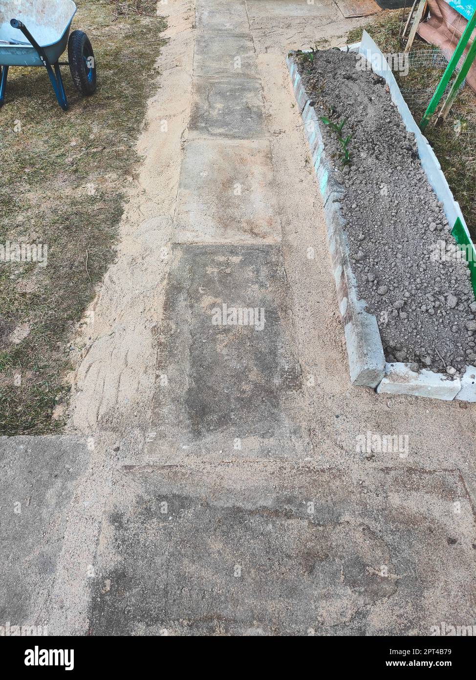 Working process of laying concrete pavement in the backyard Stock Photo ...