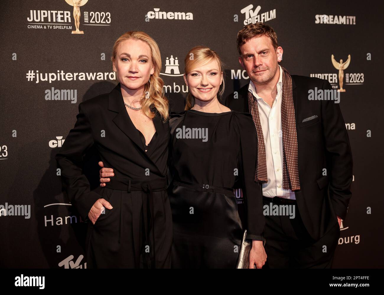 Hamburg, Germany. 27th Apr, 2023. Sebastian Bezzel (r), actor, his wife ...