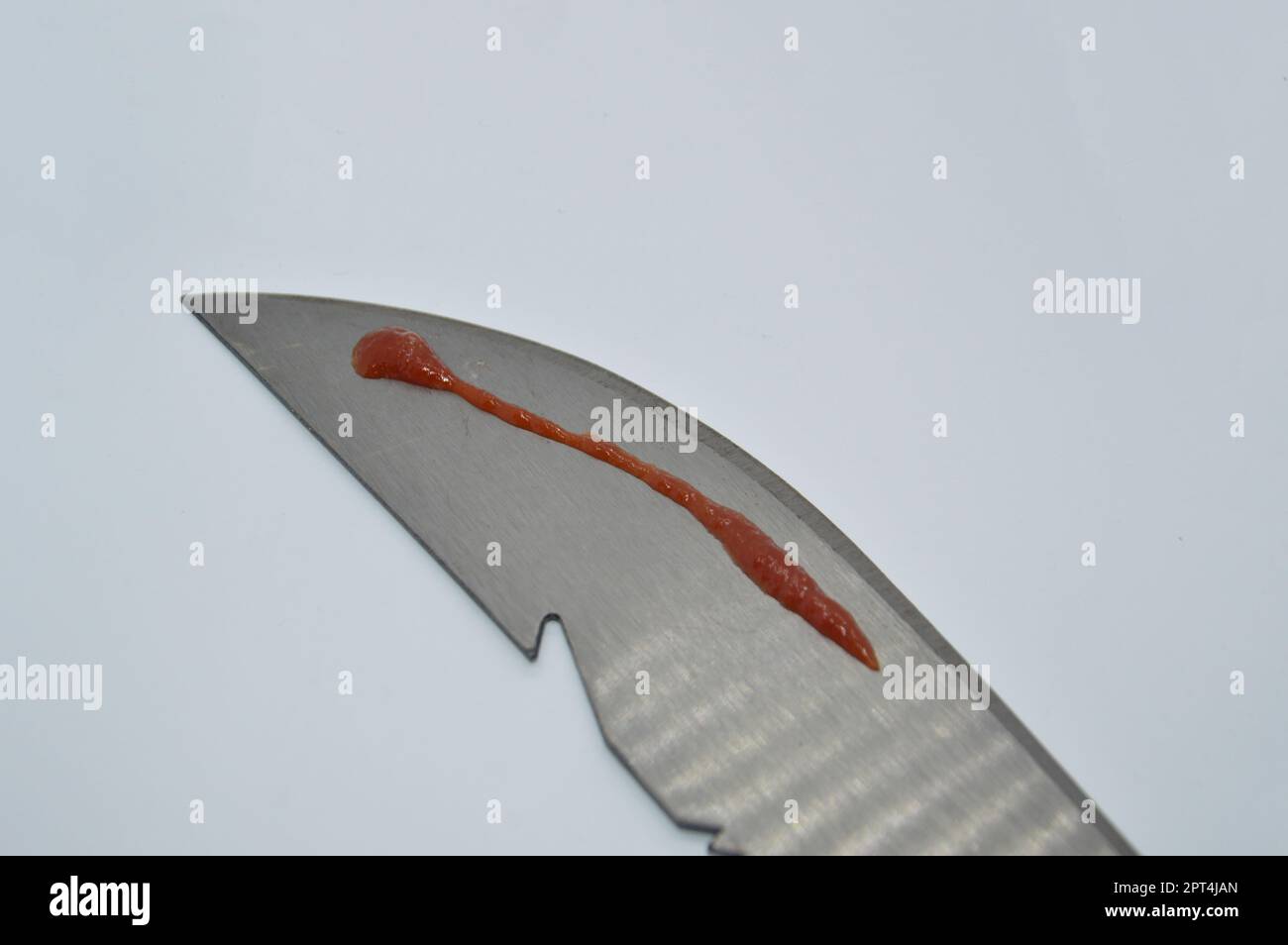 The knife is covered with red blood like a the cold weapon Stock Photo ...