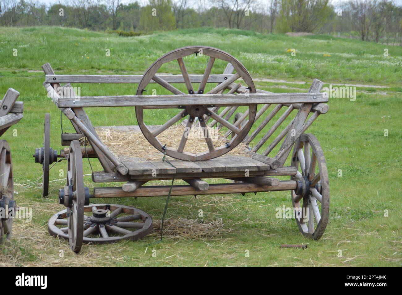 Old wooden cart for transporting goods in agriculture Stock Photo - Alamy