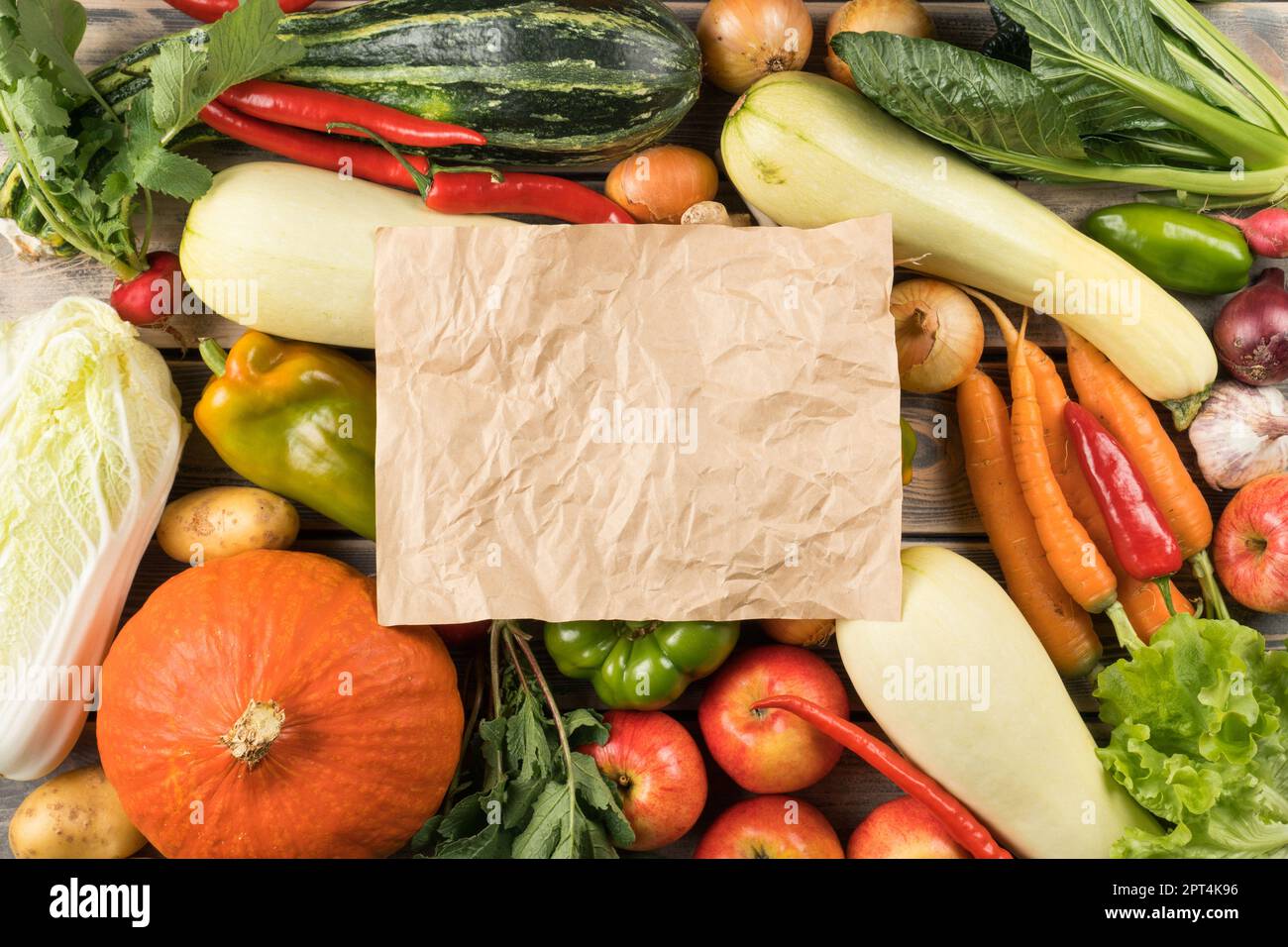 Sheet of paper on mix of different fresh farm vegetables and fruits ...