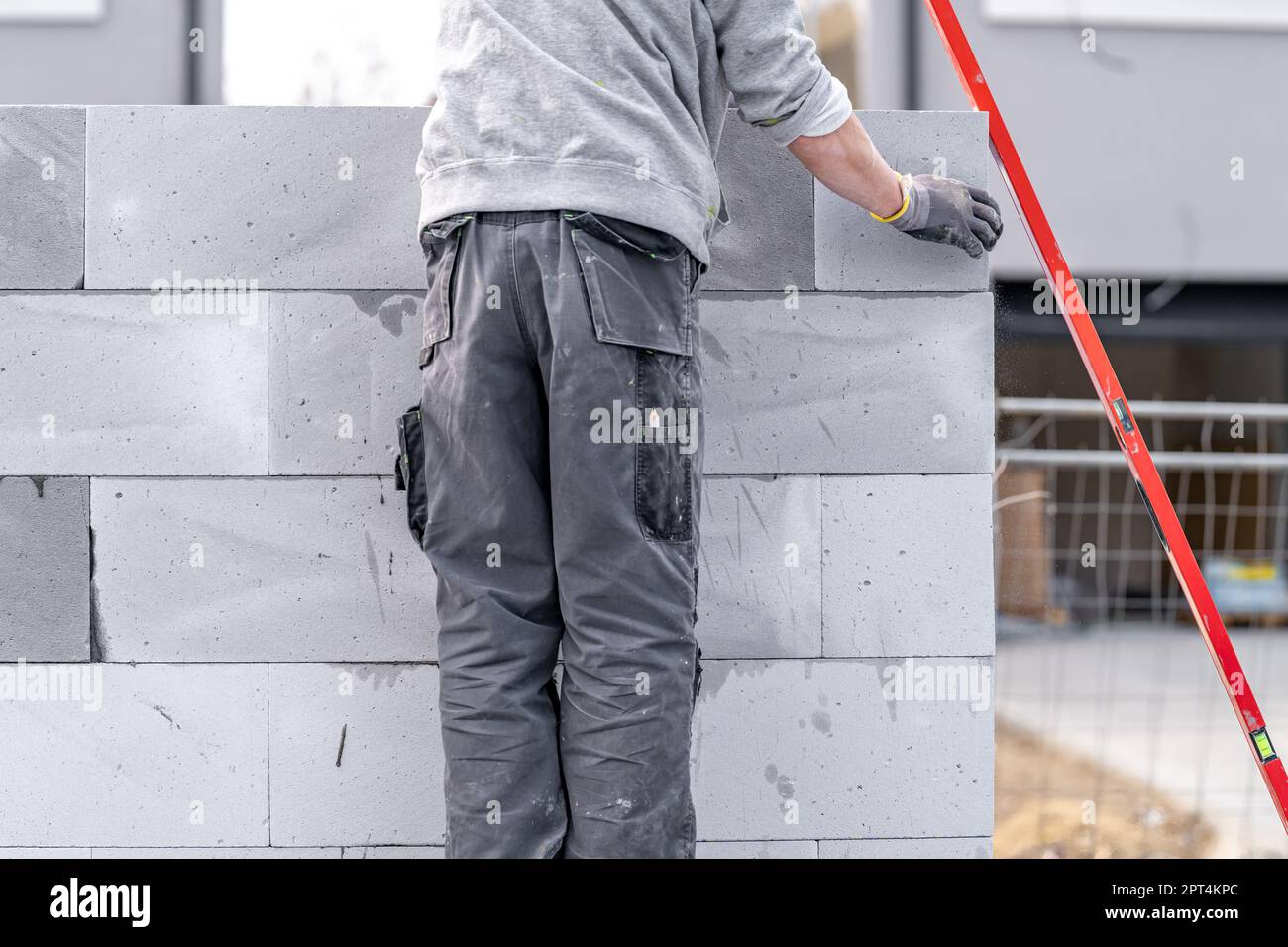 Man builds house bricks hi-res stock photography and images - Alamy