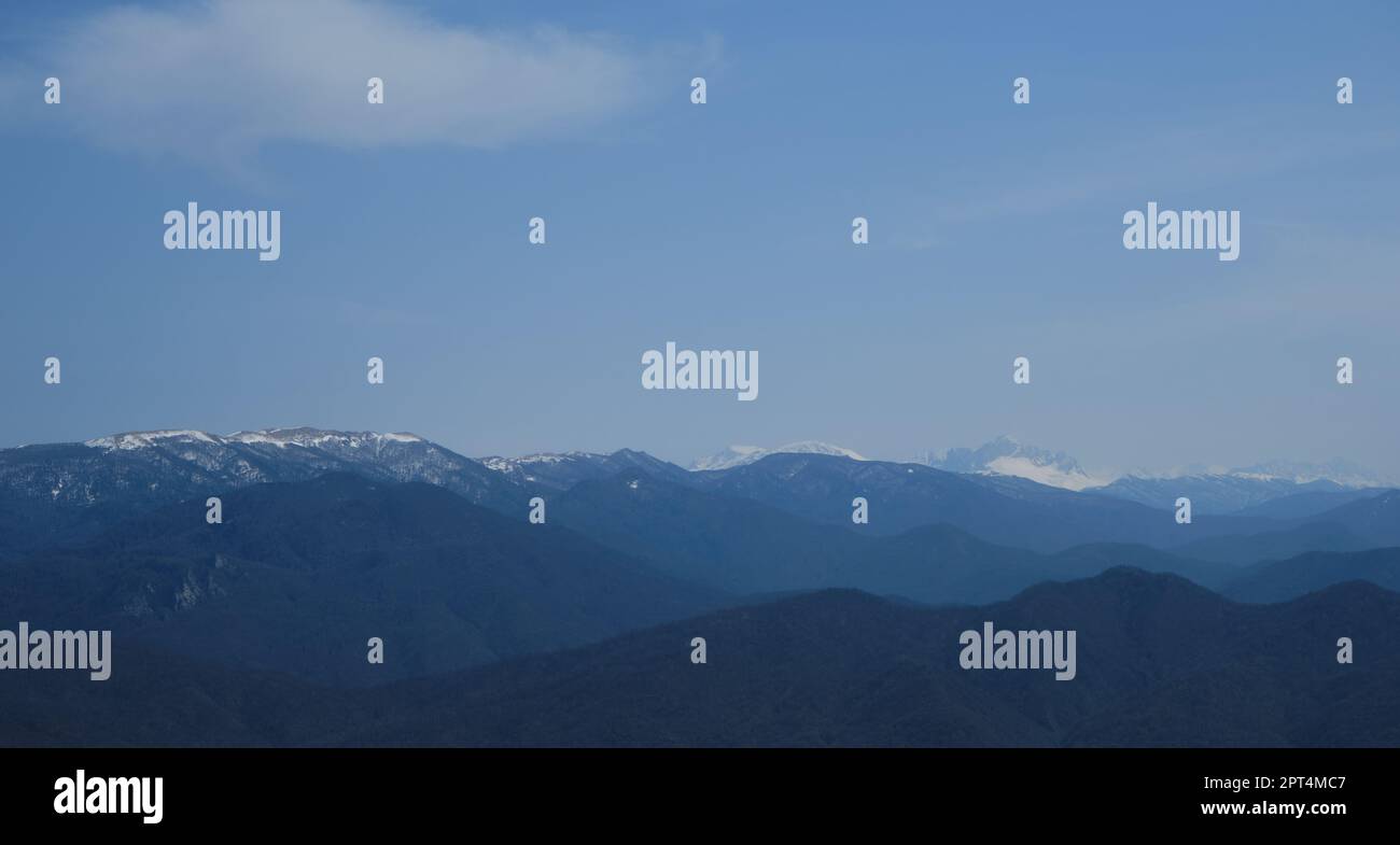 View of snowy peak of Mount Fisht from afar. Main Caucasian ridge in ...