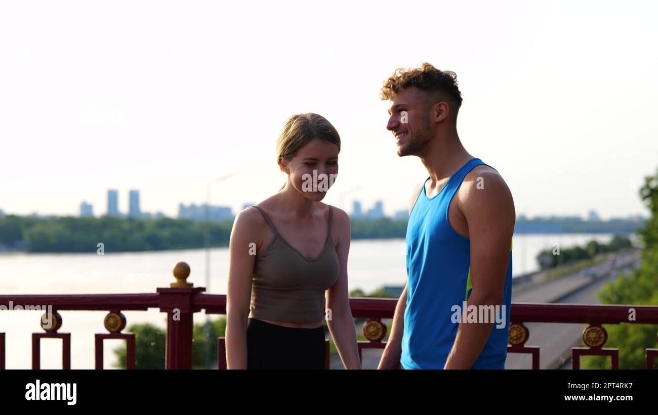 Couple talking outside in slow hi-res stock photography and images - Alamy