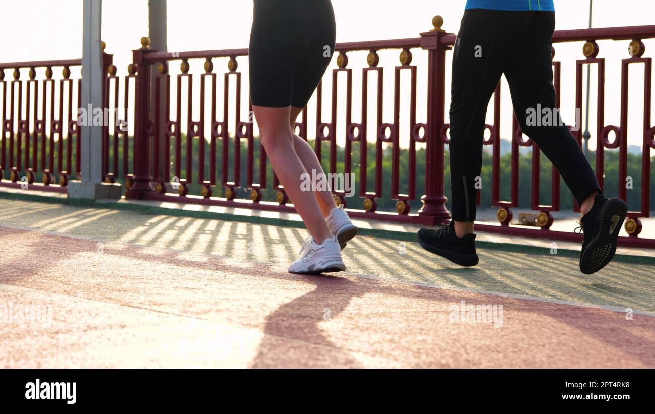 Slow motion legs woman jogging hi-res stock photography and images - Alamy