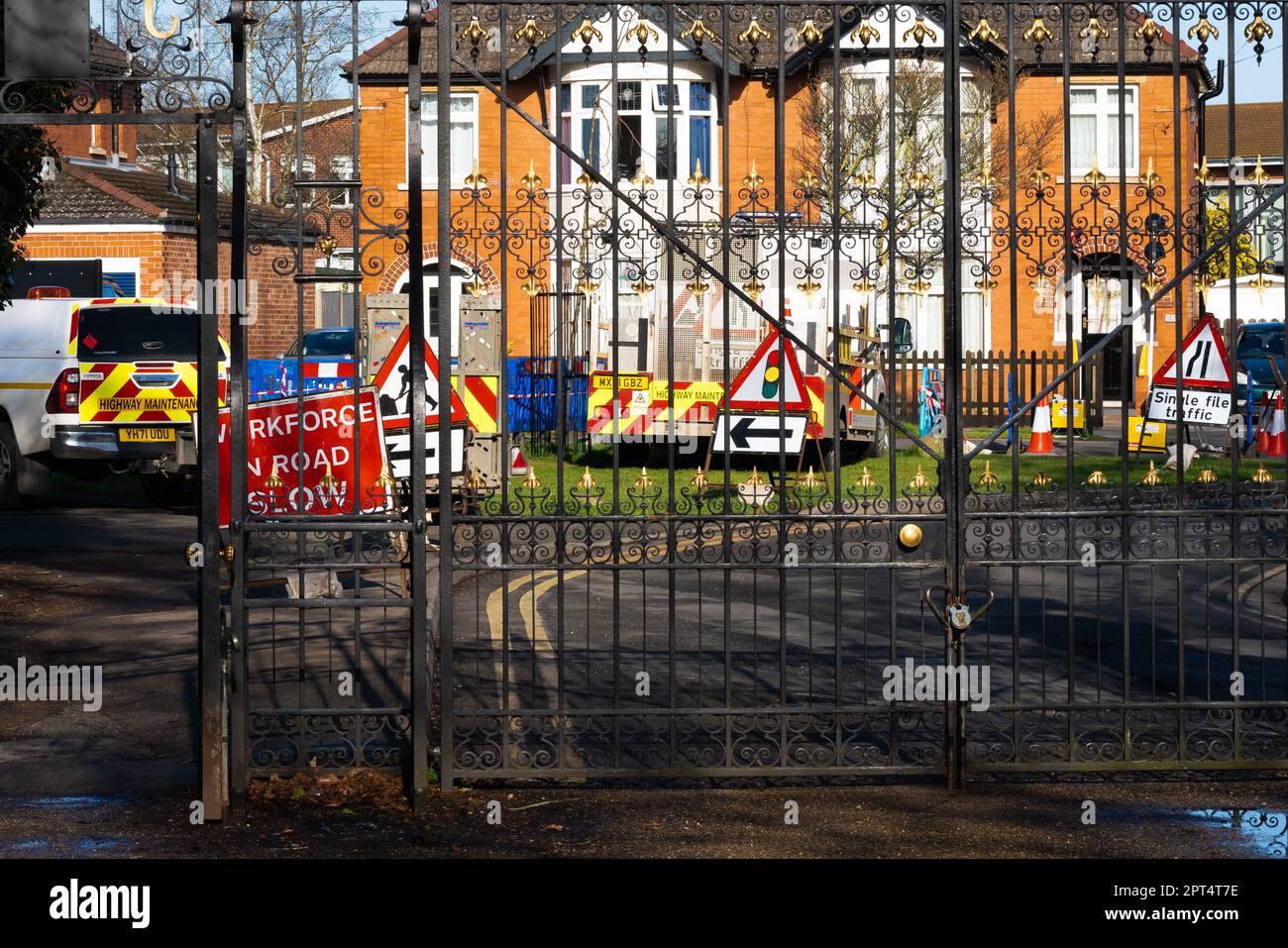 Road works, skid risk, Park Gates, wrought iron, stone chippings, grit ...