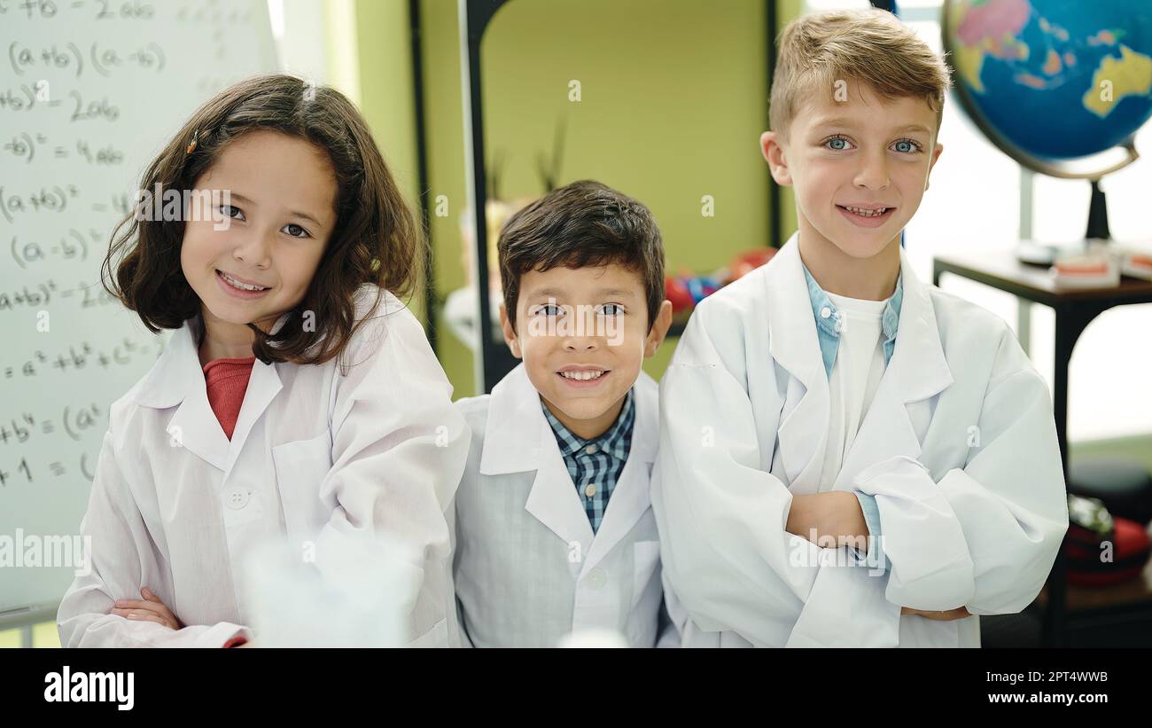 Group of kids scientists students smiling confident standing with arms ...
