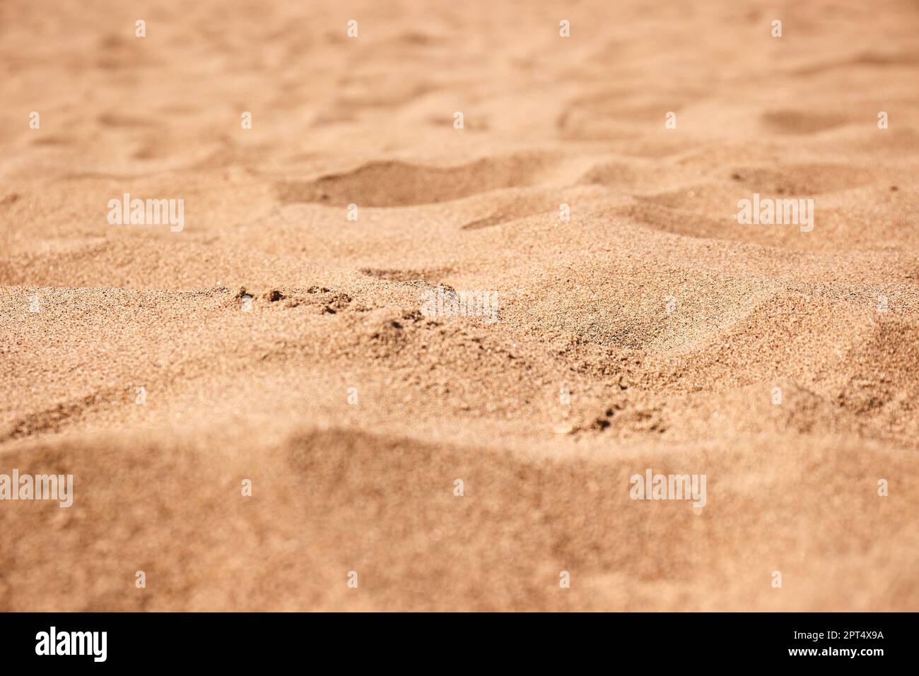 Lines in the sand of a beach close up Stock Photo - Alamy