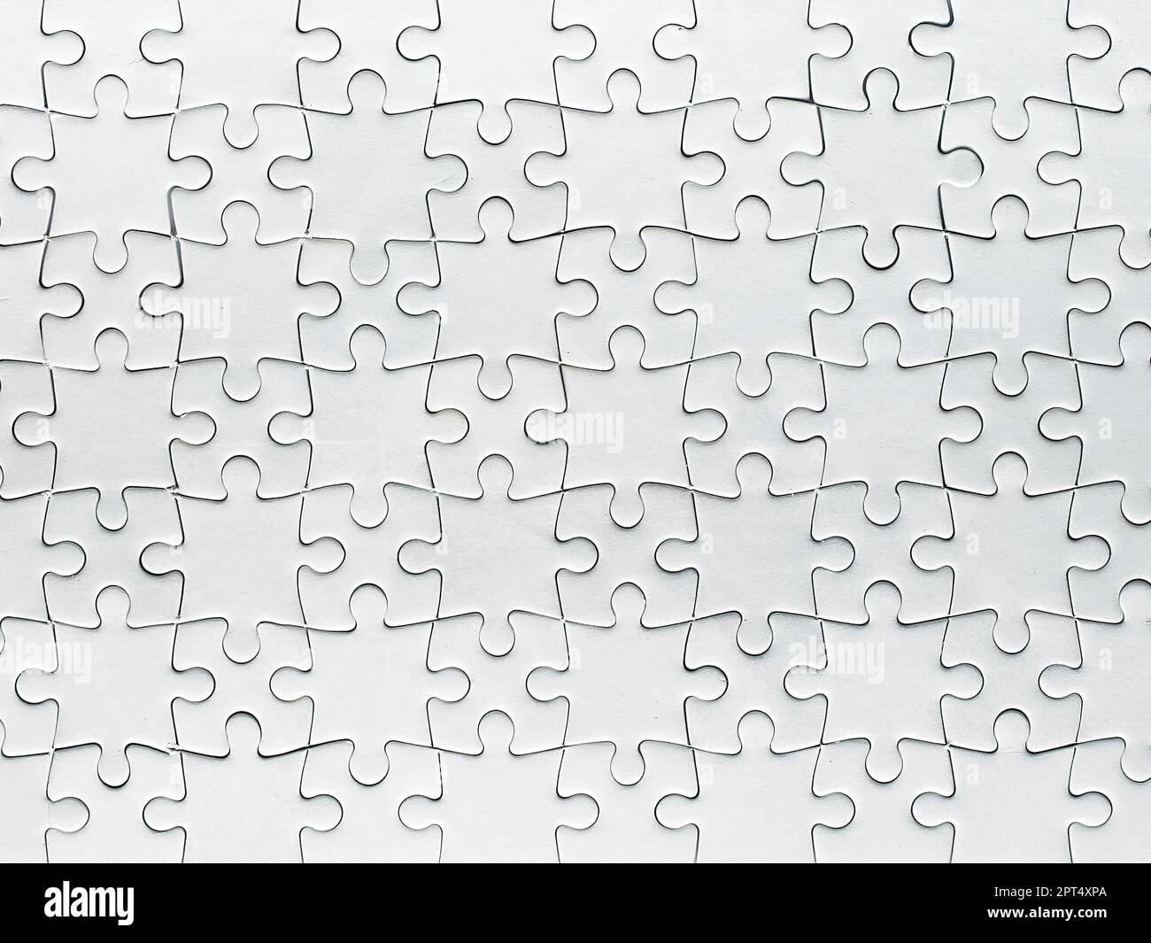 White jigsaw puzzle Stock Photo - Alamy