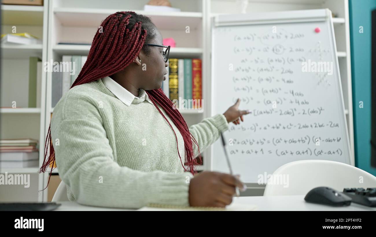 African woman braided hair teaching hi-res stock photography and images ...