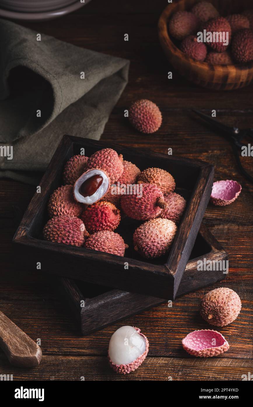 Fresh Lychees in Small Wooden Tray Stock Photo - Alamy