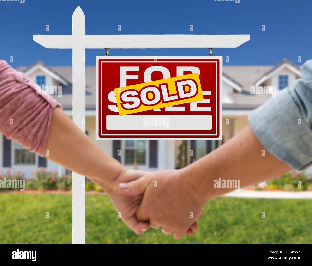 Couple Holding Hands In Front of Beautiful New House and Sold For Sale ...