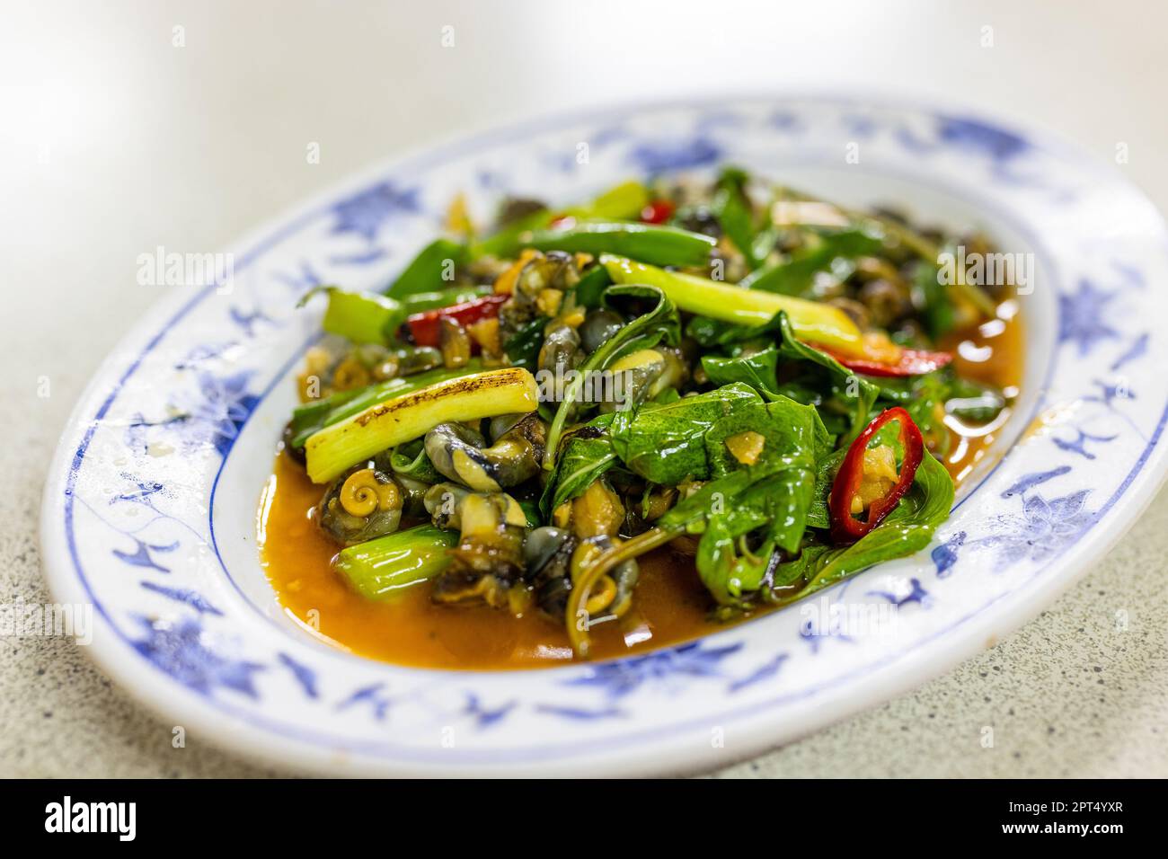 Penghu seafood stir fried seafood snail Stock Photo - Alamy