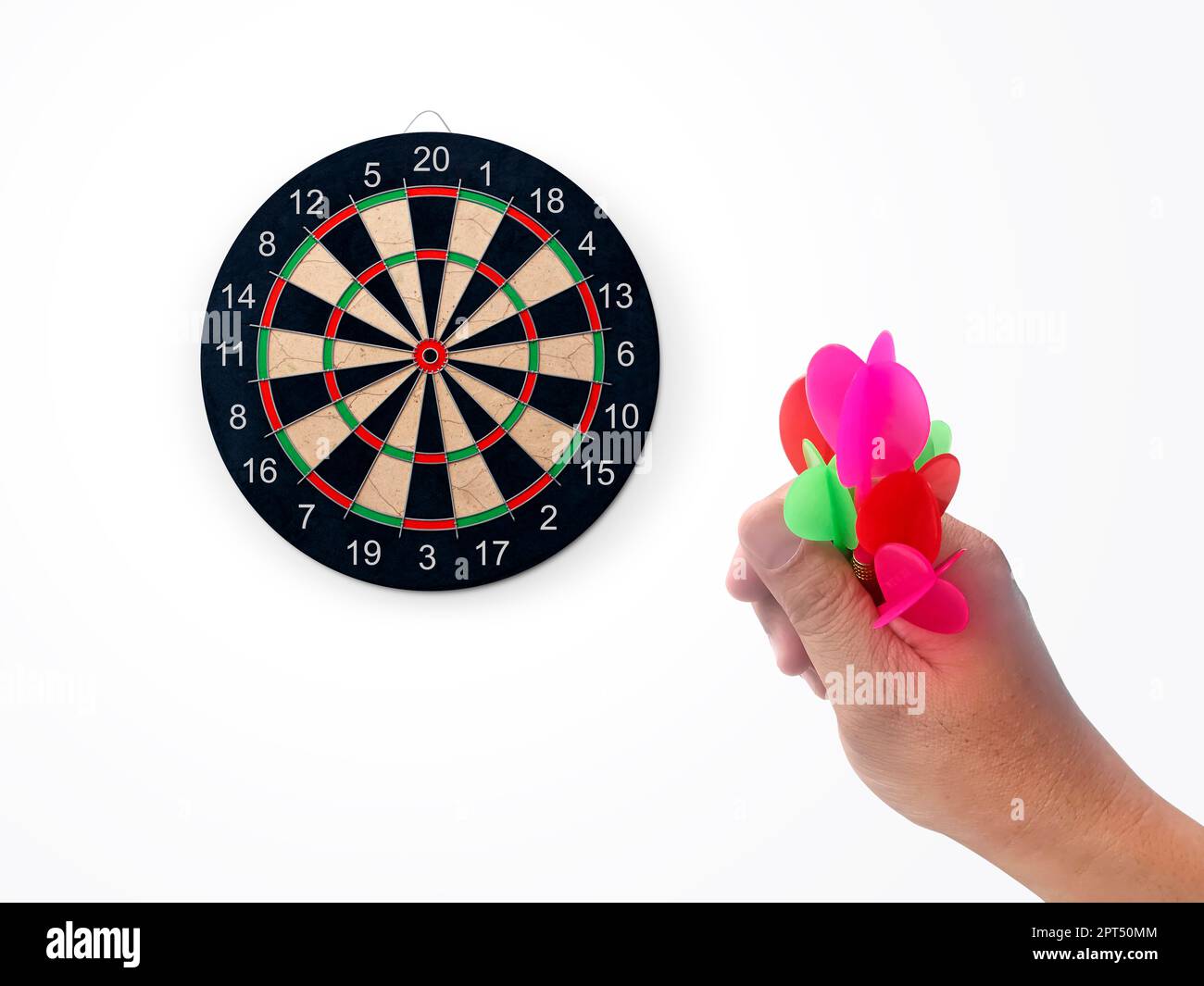 Human hand is throwing the darts target to the darts board. a man's ...