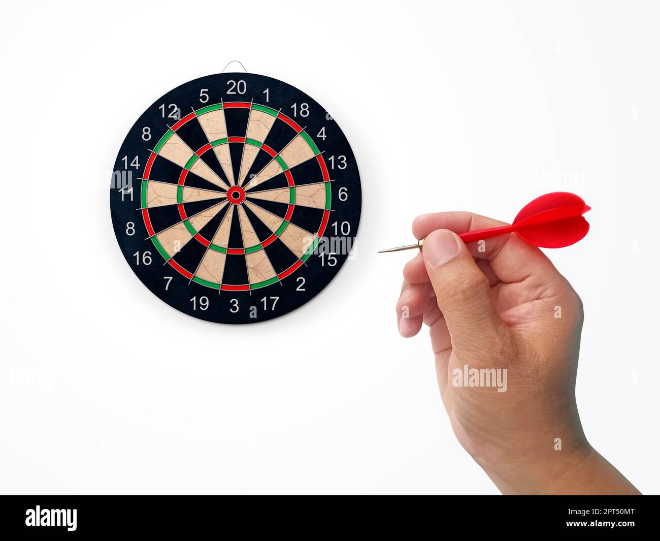 Man throwing dart at dart board hi-res stock photography and images - Alamy