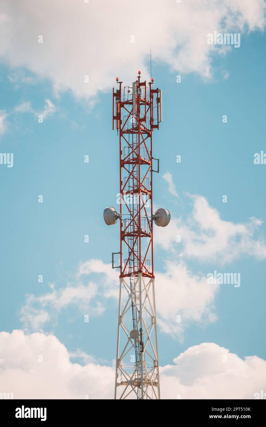 Telecommunications Cell Phone Tower With Antenna On Sunny Sky ...