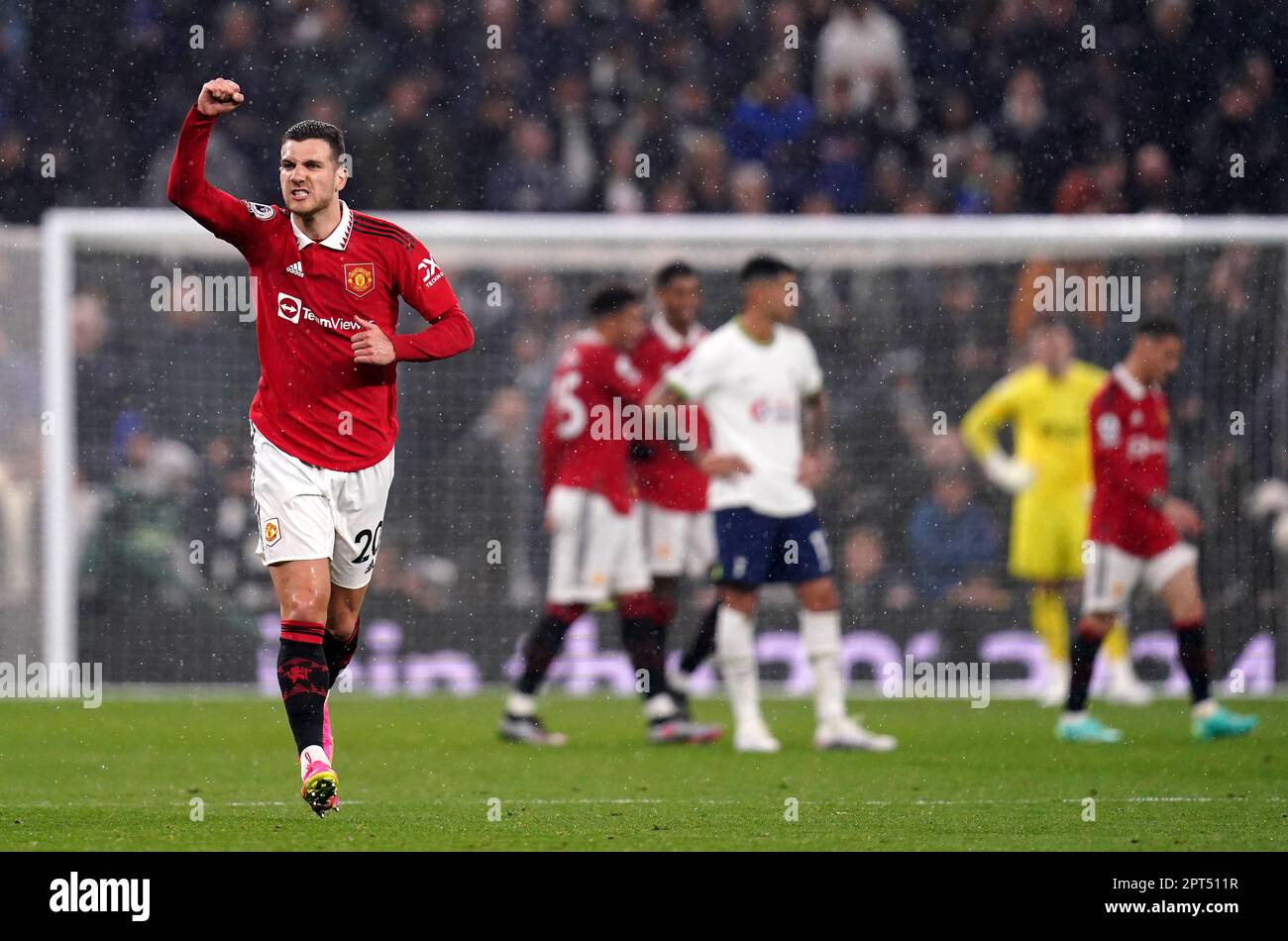 Manchester United's Diogo Dalot gestures to the fans after Marcus ...