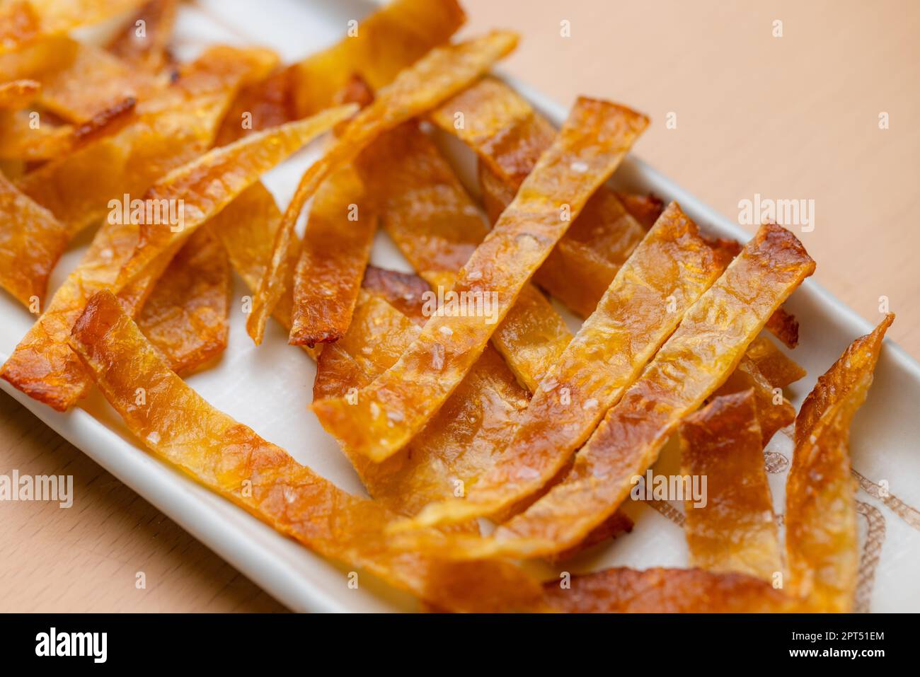 Cooked dried fish fillet snack Stock Photo - Alamy