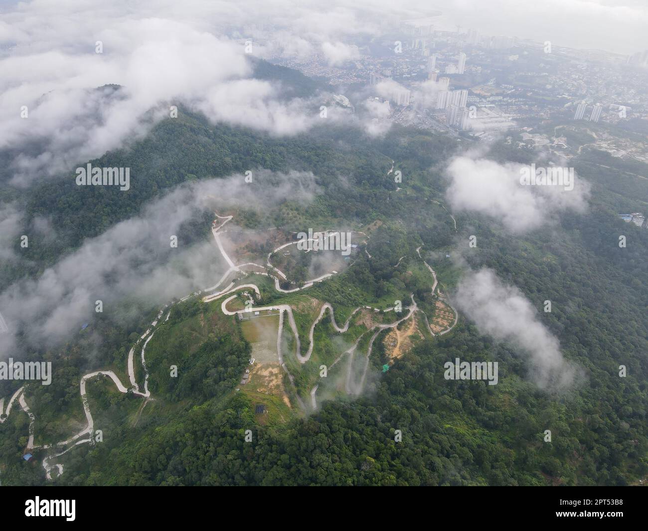 Aerial view rural road at Iconic Hill at Pulau Pinang in rain cloud ...