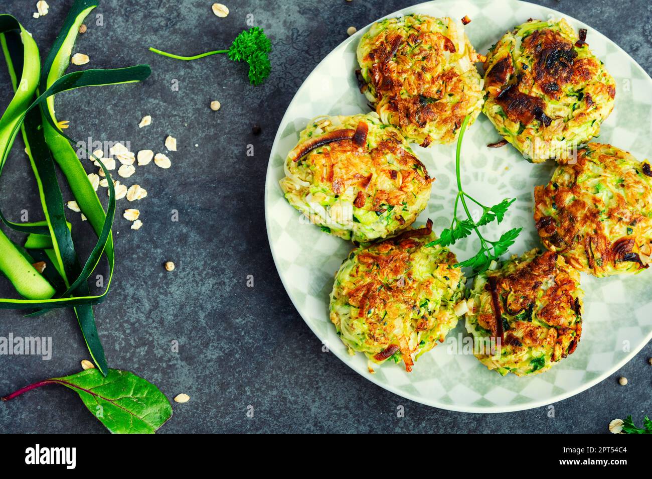 Vegan cutlets from zucchini, oatmeal and greens. Healthy food ...