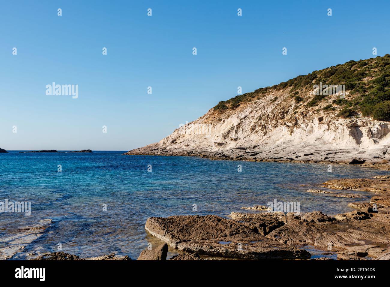 unusual rock formations of the volcanic cliff on Cala Sapone beach ...
