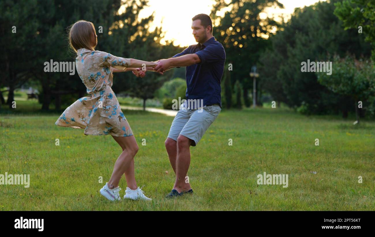 Slow motion romantic couple spinning hi-res stock photography and ...