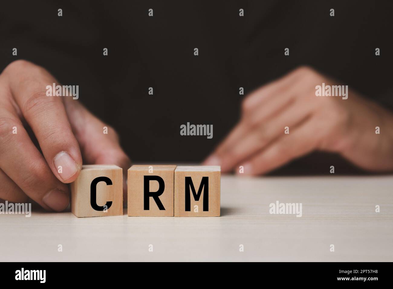Wooden cubes with CRM Customer relationship management automation ...