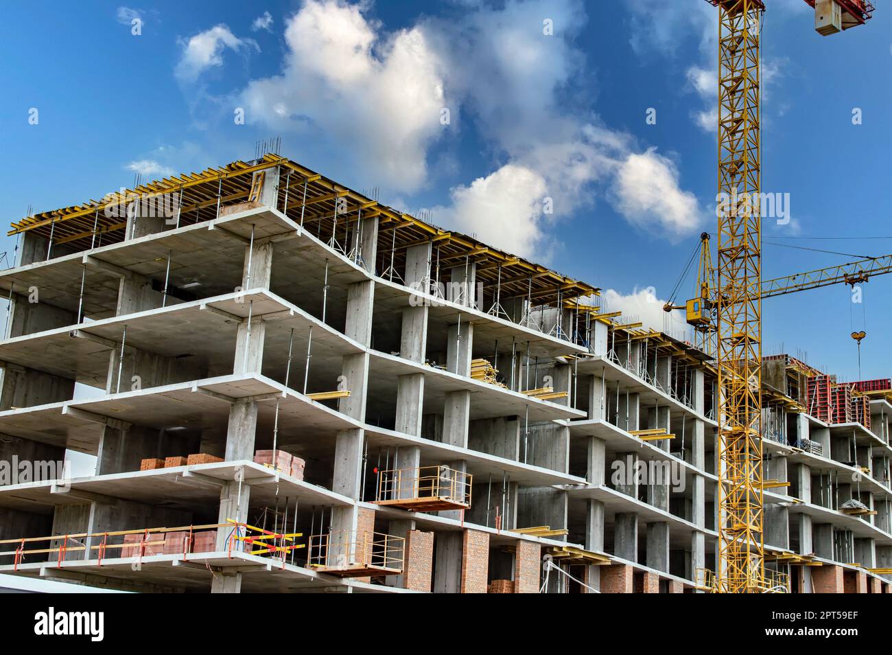 Frame of a new residential building under construction. New building ...