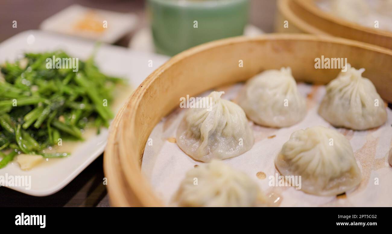 Chinese style steamed soup bun in restaurant Stock Photo - Alamy
