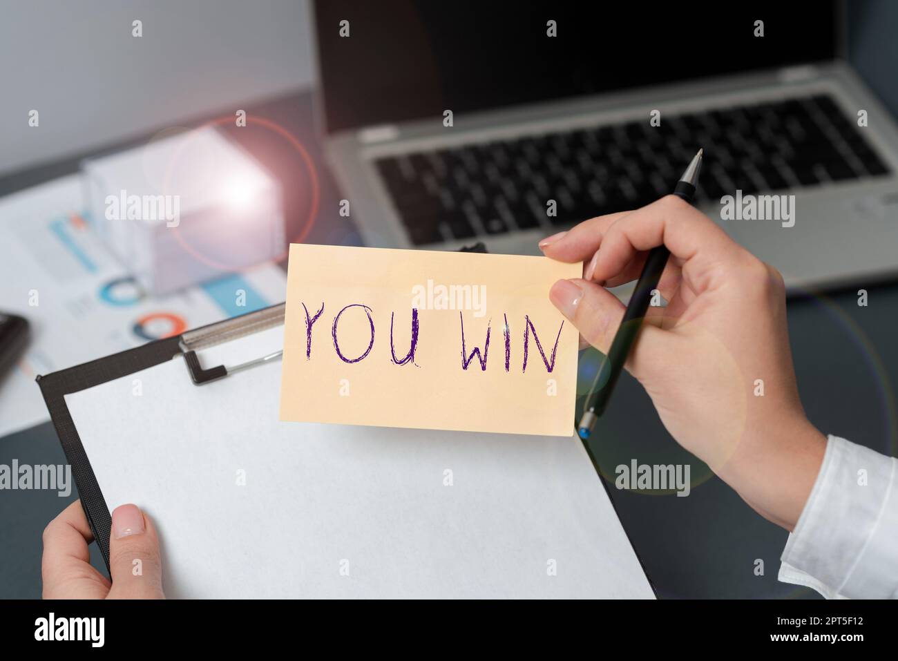 Sign displaying You Win, Word Written on be first in school race or ...