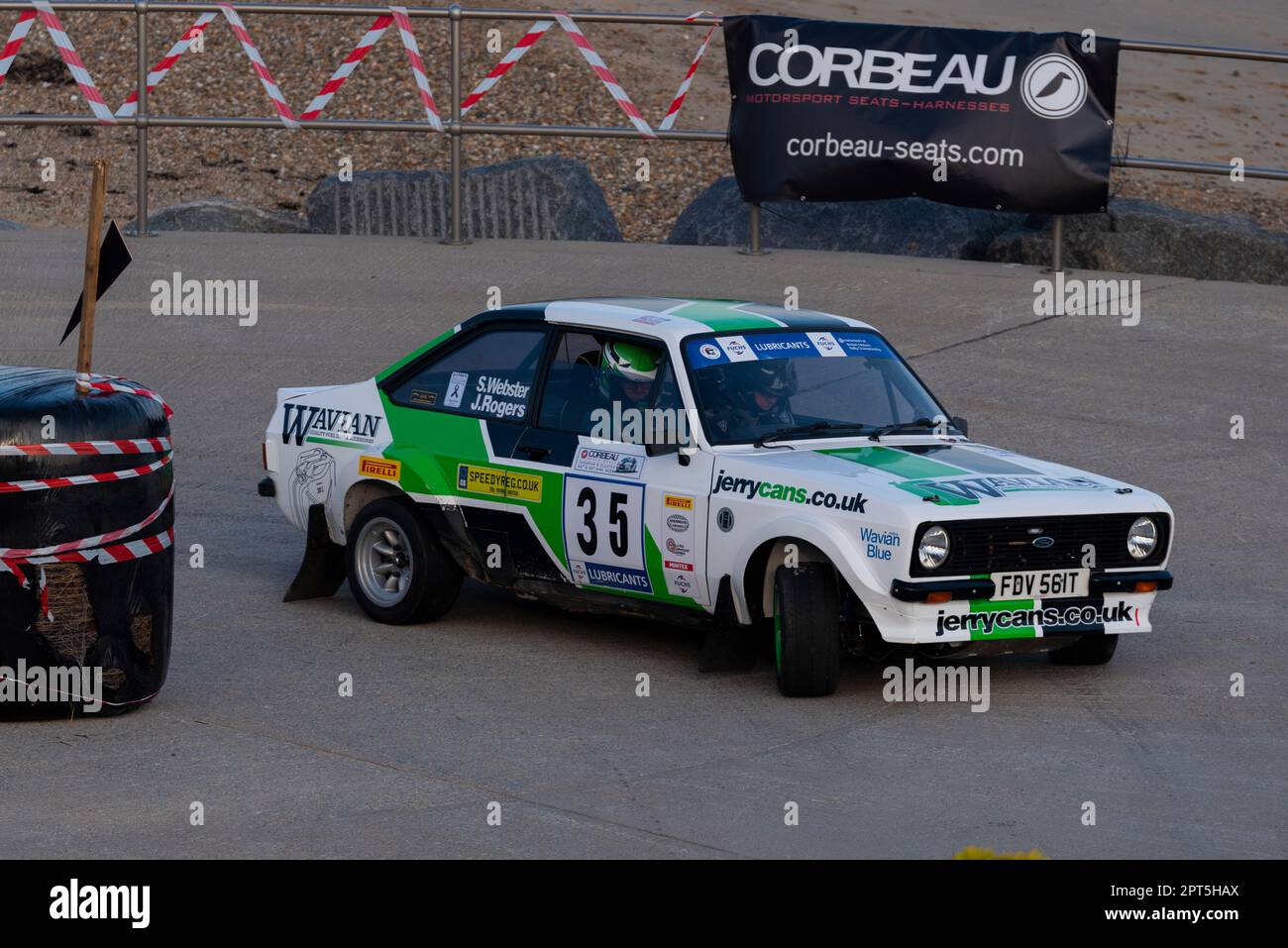 Simon Webster racing a Ford Escort RS1800 competing in the Corbeau ...