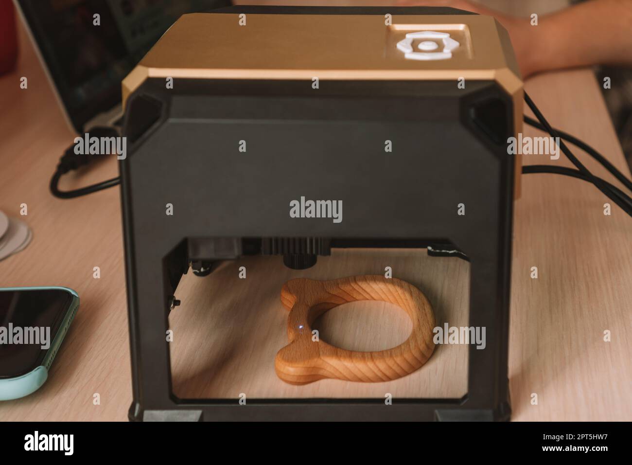 Desktop laser wood burning machine uses a blue laser beam to inscribe ...