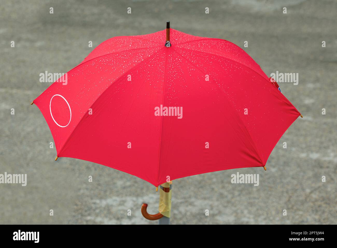 Vivid Red Umbrella Open at Rainy Day Stock Photo - Alamy