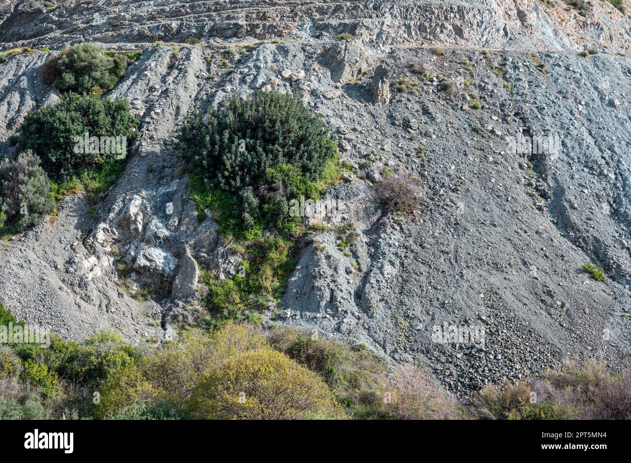 Mountains with textured erosion and grey gravel in Peyia, Cyprus Stock ...