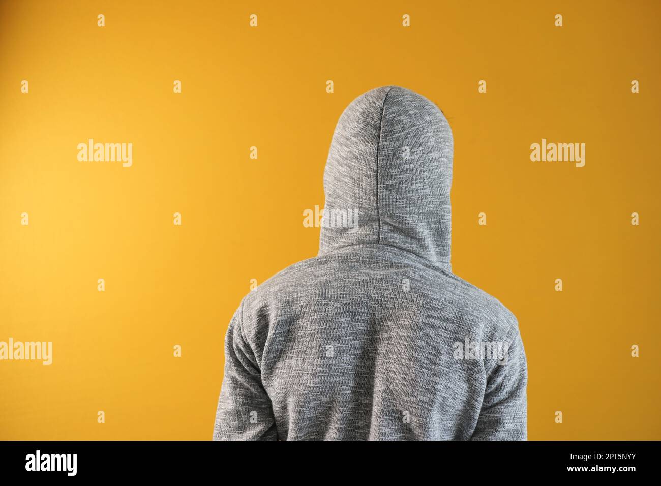 sad man in hood cover hide his face Stock Photo - Alamy