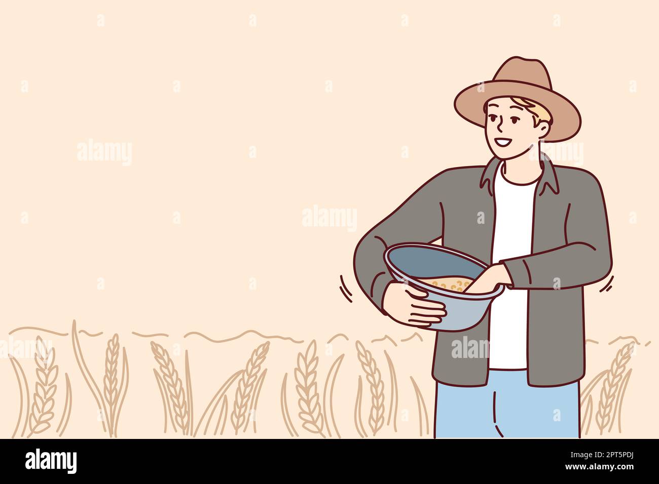 Male farmer working in field on harvest season. Smiling man busy with ...