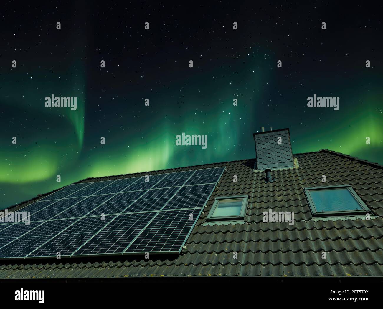 Solar panels producing clean energy on a roof of a residential house ...