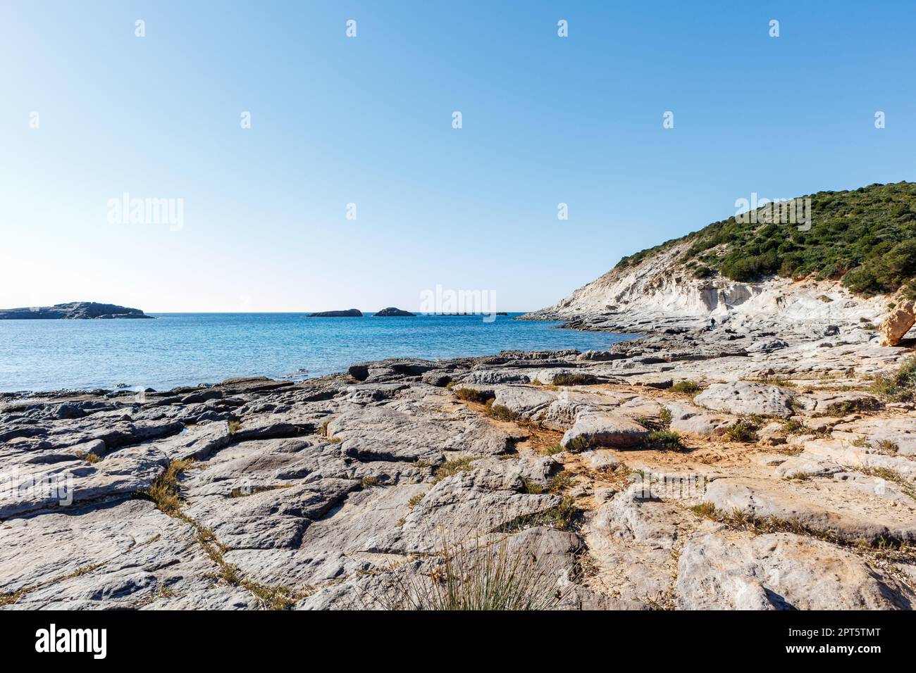 unusual rock formations of the volcanic cliff on Cala Sapone beach ...