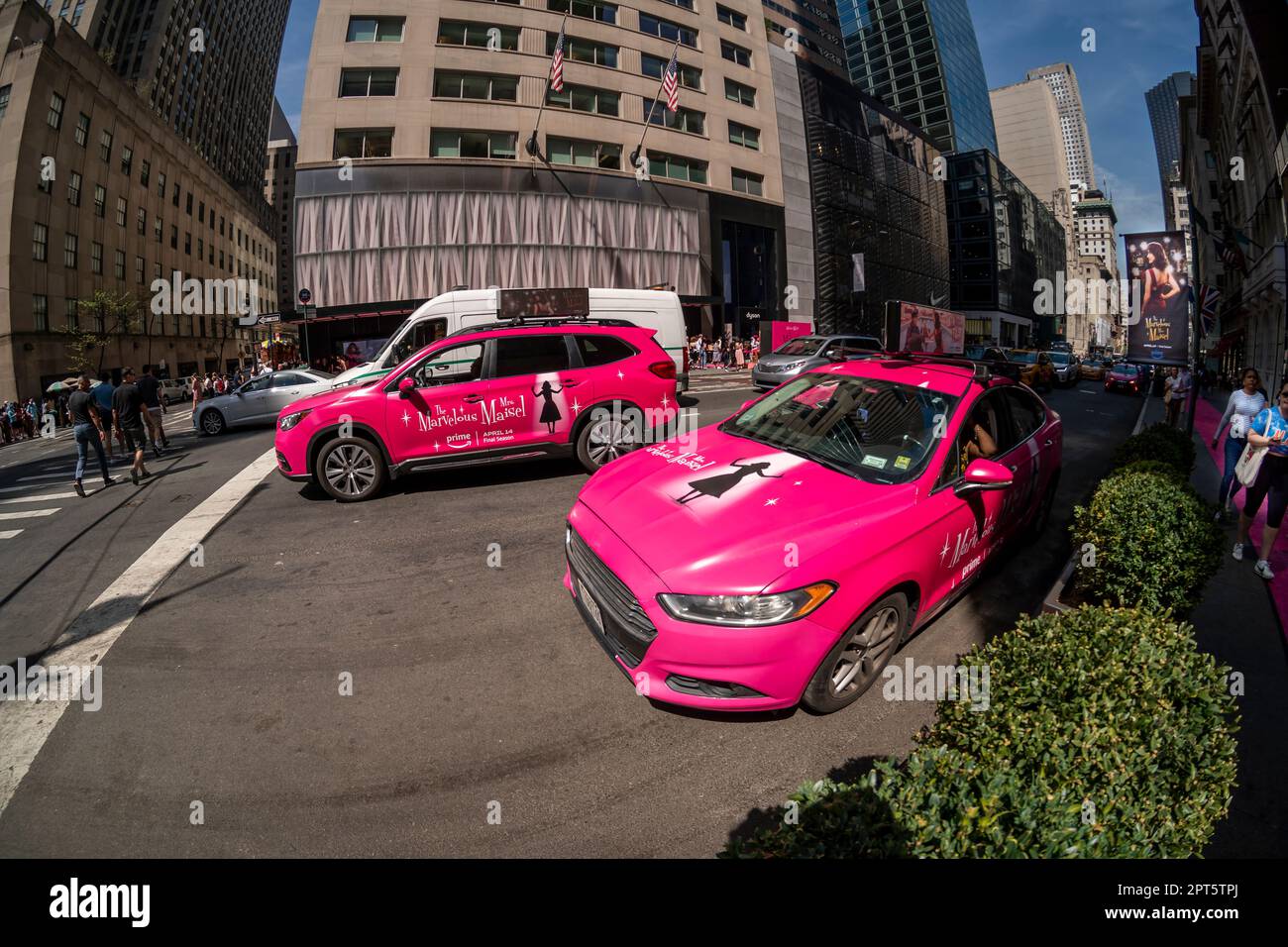 Hordes of fans and passer-by throng Fifth Avenue for an extensive brand ...