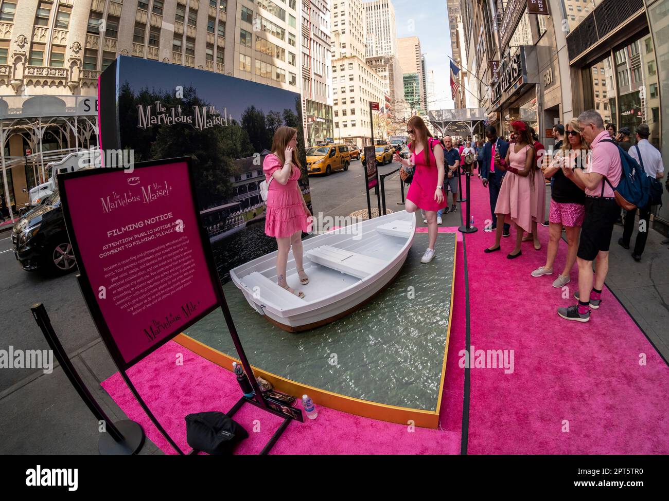Hordes of fans and passer-by throng Fifth Avenue for an extensive brand ...